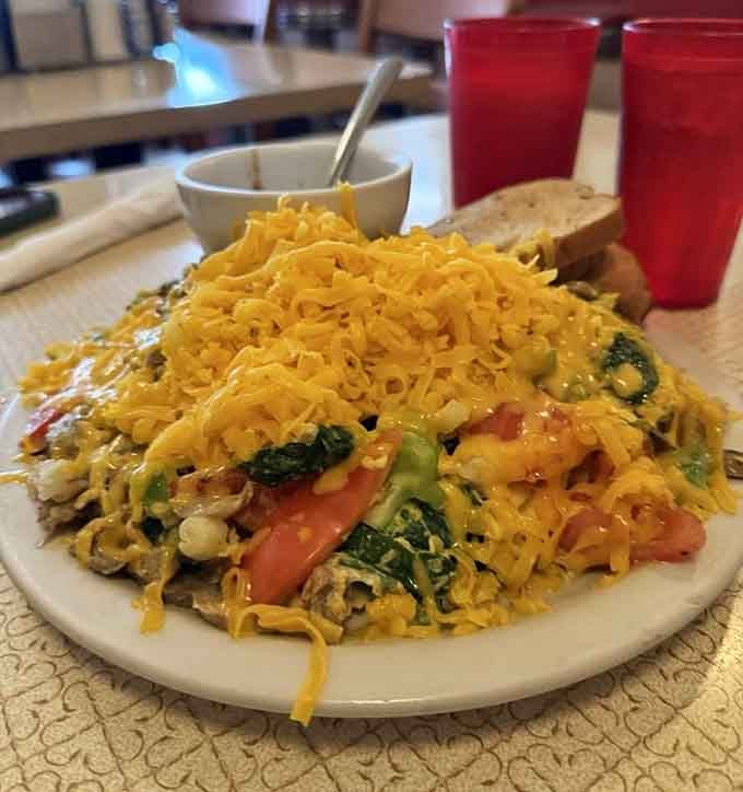 That cheese mountain isn't a garnish, it's a statement of intent from a kitchen that understands Wisconsin.