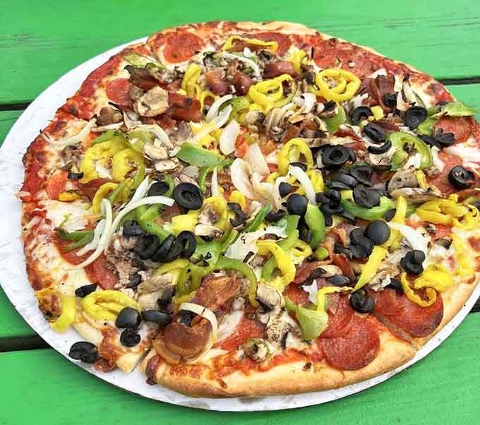 Loaded with toppings and possibilities, this pizza means serious business for serious appetites.