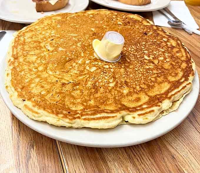 When your pancake is literally the size of the plate, you know you've found a place that understands portion control is optional.