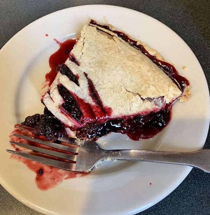 That blackberry filling is so dark and rich it looks like edible velvet tucked into flaky pastry perfection.
