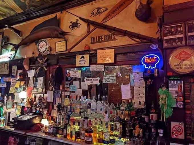 The back bar rises like a shrine to every beer brand your dad ever mentioned, plus a few he definitely didn't.