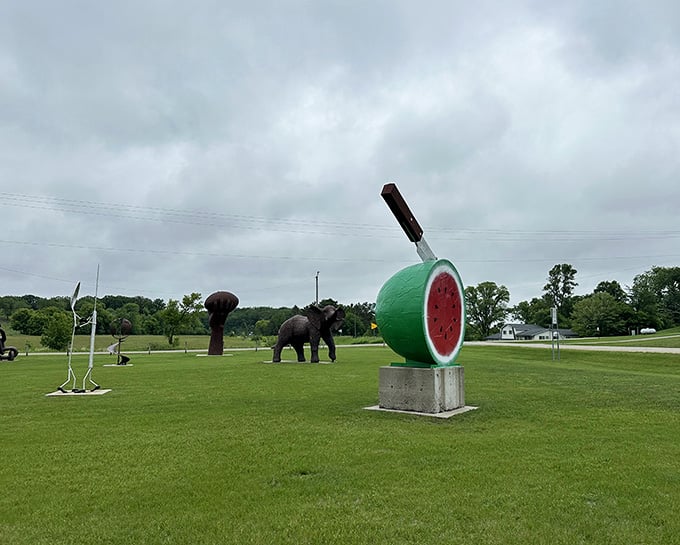 Nothing says summer quite like a giant watermelon with a knife, ready for the world's most ambitious picnic.