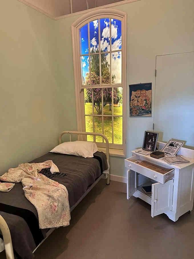 A recreated patient room shows surprisingly pleasant conditions, though the reality varied greatly depending on the era and circumstances.