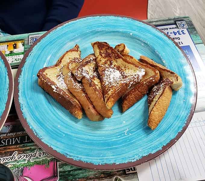 French toast done right, dusted with powdered sugar and ready to make your morning infinitely better than it was.