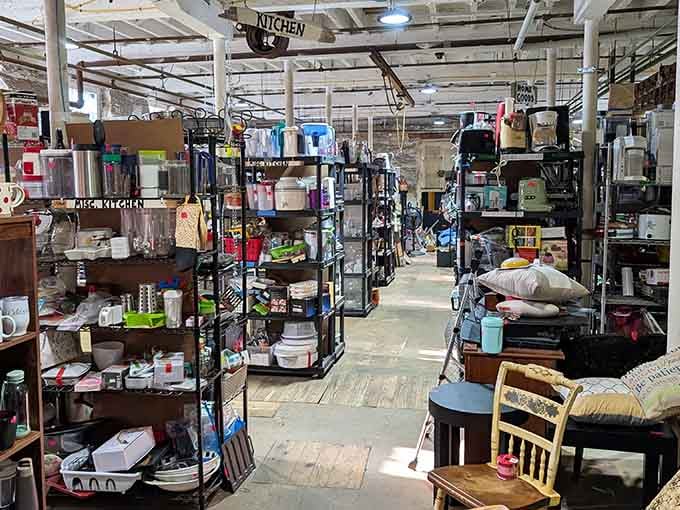The main floor stretches out like a treasure map, with kitchen gadgets and household goods creating their own organized chaos.