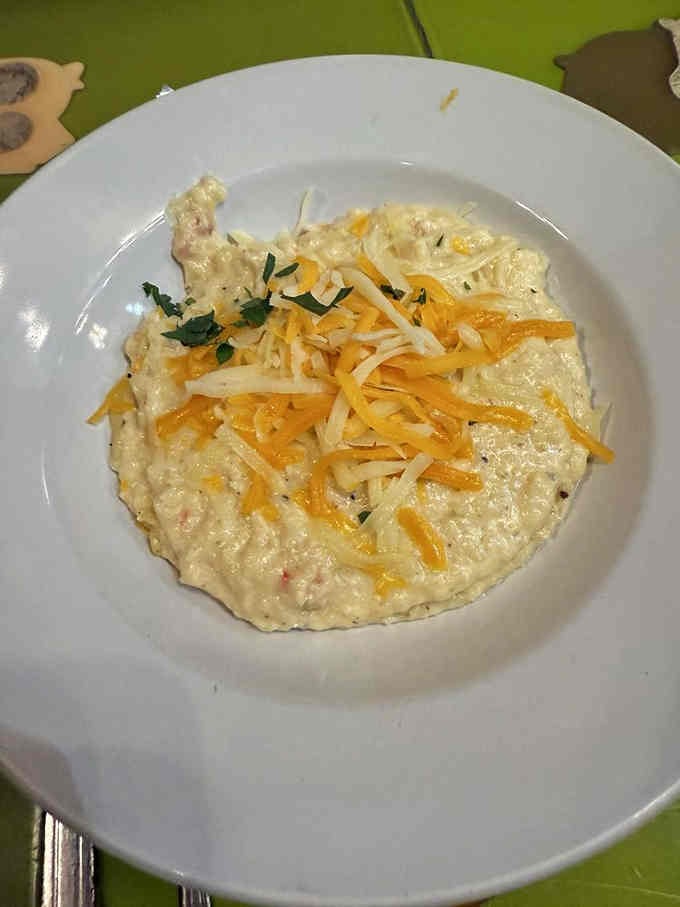 Creamy grits topped with cheese prove that simple Southern classics never go out of style, ever.