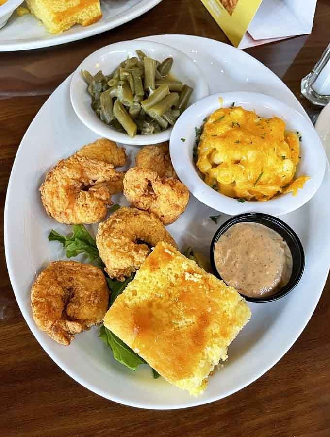 Jumbo shrimp with mac and cheese and green beans deliver the kind of satisfaction that makes you forget your troubles.