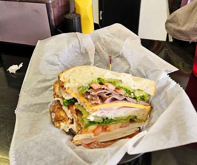 The Dagwood towers with enough meat and cheese to make your cardiologist nervous and your taste buds ecstatic.