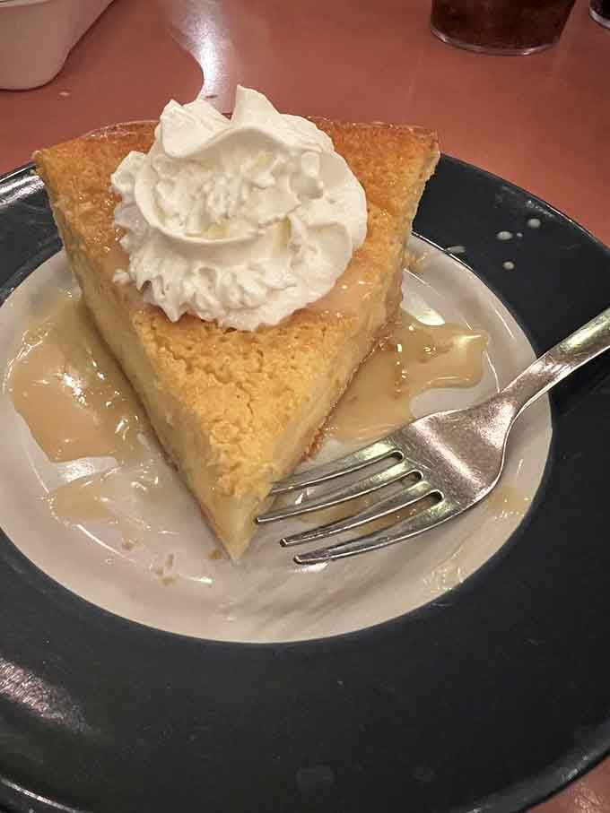 This slice of pie isn't just dessert&mdash;it's therapy on a plate, complete with a cloud of whipped cream that deserves its own zip code.