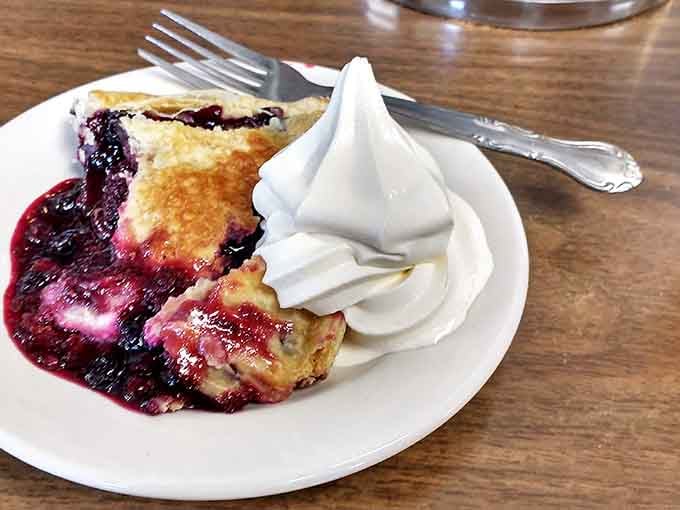 Pie that would make your grandmother simultaneously proud and jealous. That berry filling isn't just fruit&mdash;it's summer captured in a perfect slice.