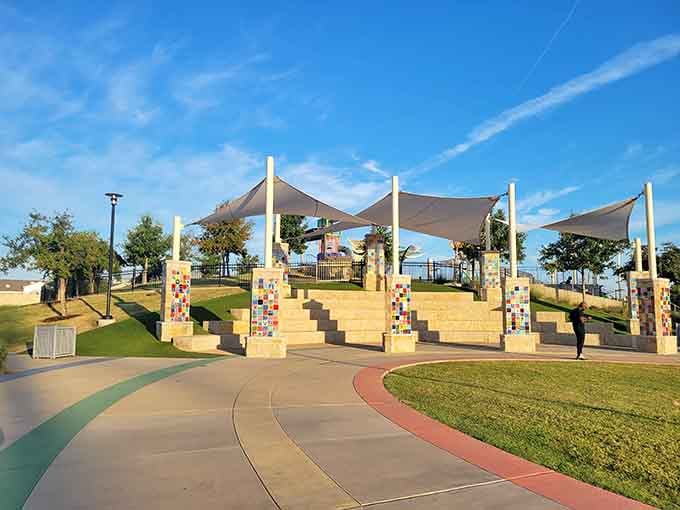 An amphitheater-style gathering space where families can rest while kids burn off energy that defies all known laws of physics.