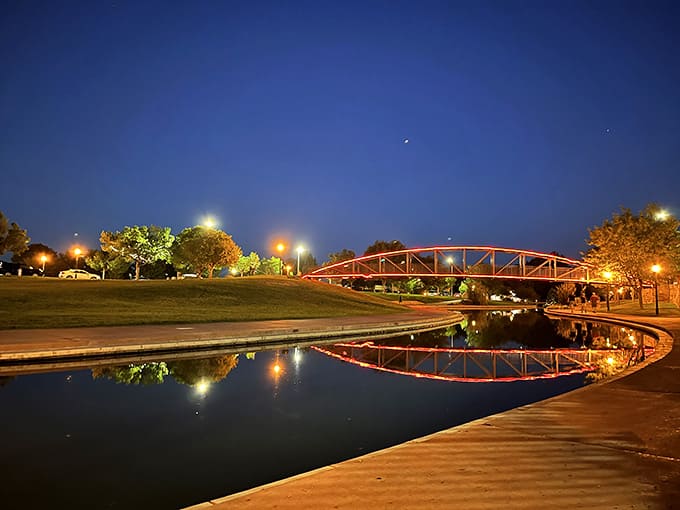 Evening lights transform the Riverwalk into something magical, like someone dimmed the house lights for romance.