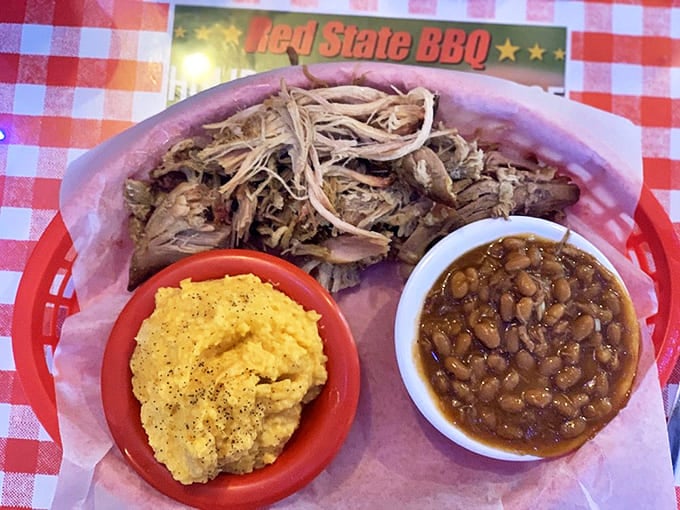 Pulled pork that's had a proper introduction to smoke, alongside corn pudding and baked beans that refuse to be overshadowed. A trifecta of flavor.