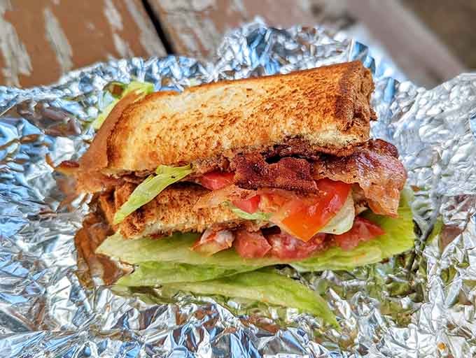 A BLT that takes the classic sandwich formula and elevates it to an art form worth the drive alone.
