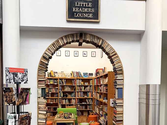 That archway made of books isn't just clever decoration—it's a portal to literary adventures for little ones.