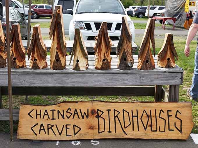 Chainsaw-carved birdhouses that are fancier than most studio apartments, and the rent is absolutely free for feathered tenants.