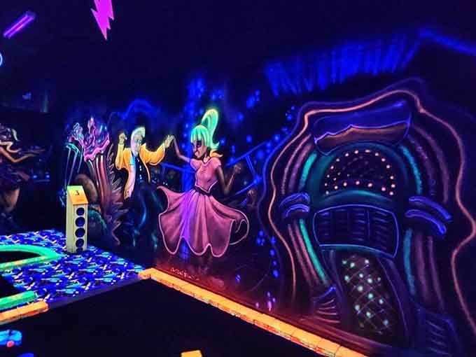 Psychedelic murals wrap around each hole, making you wonder if the artists raided someone's vintage poster collection first.