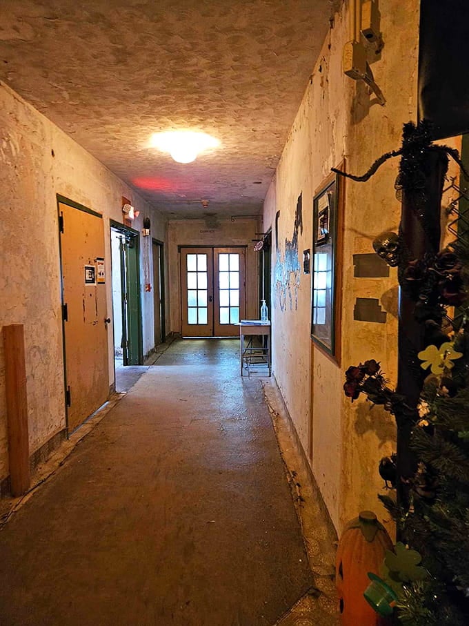 Peeling paint and worn floors tell stories of decades past, when these hallways bustled with residents and staff alike.