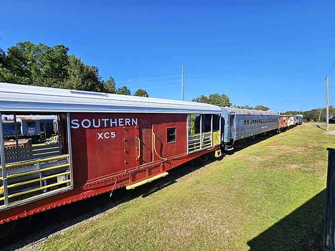 The Southern Railway caboose stands ready to show you where the crew lived, worked, and probably complained about the coffee.