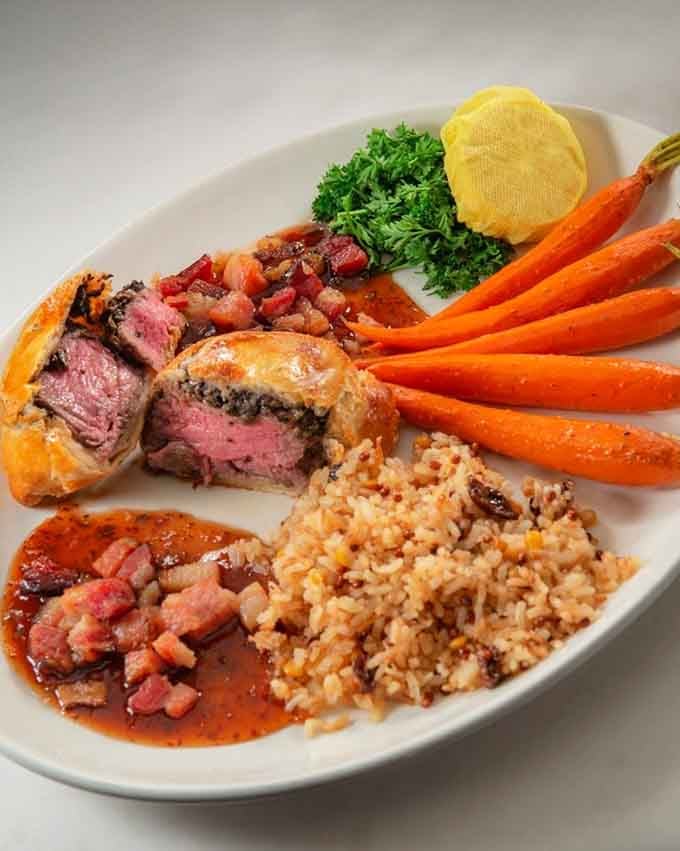 Beef Wellington meets lobster tail in this surf-and-turf masterpiece that'll make you rethink all your life choices.