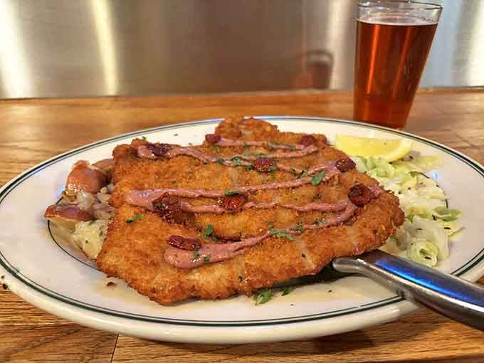 Schnitzel that would make your German grandmother weep with joy, perfectly crisp and resting on a bed of tangy slaw.