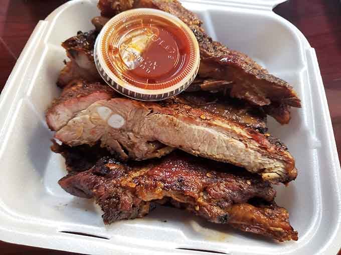 These ribs have the kind of bark that makes you wonder why anyone bothers with fancy restaurants and white tablecloths.