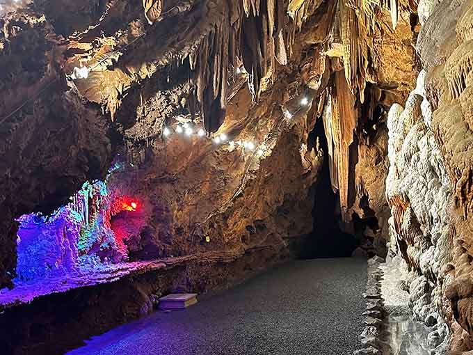 Colorful lighting transforms the cavern into an alien landscape, straight out of a classic sci-fi adventure.