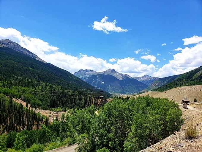 Historic mining structures dot the landscape, silent witnesses to the backbreaking work that built this improbable mountain community from scratch.