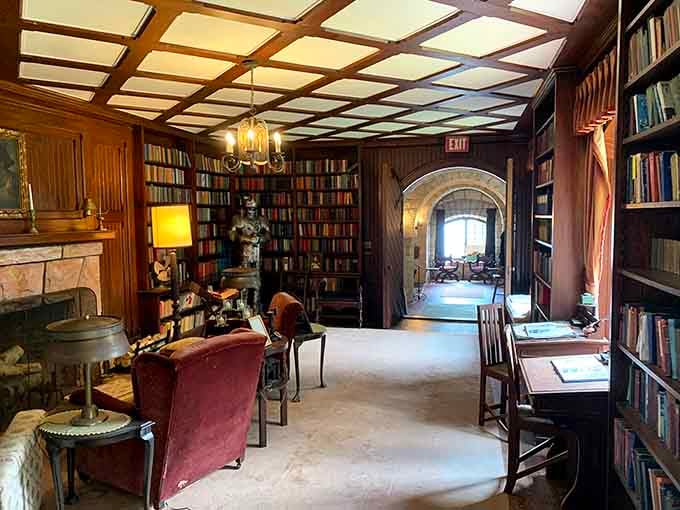 Floor-to-ceiling bookshelves in a castle library, because sometimes dreams do come with built-in shelving.