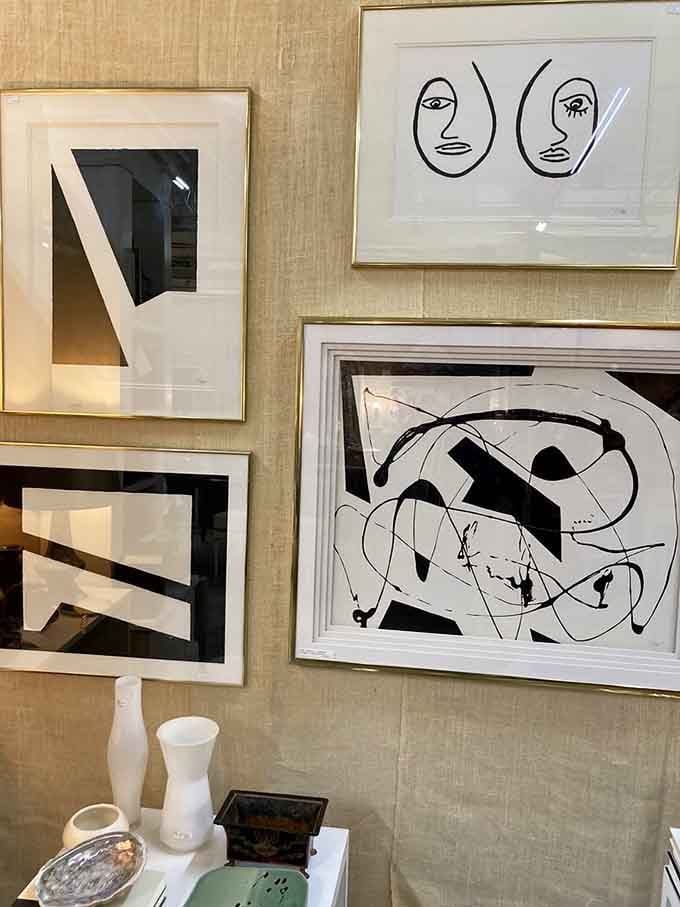 Modern art meets vintage frames in this eclectic display that proves abstract expressionism never really goes out of style.