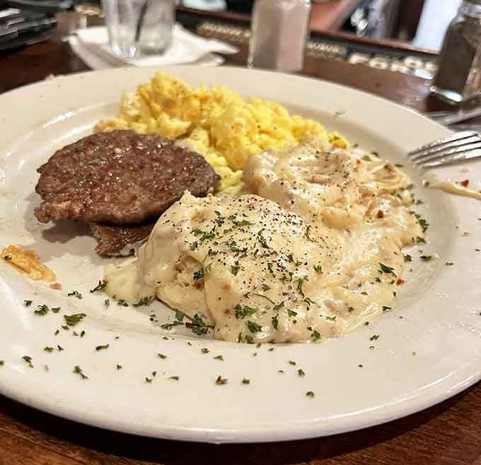Breakfast of champions, Southern-style: where gravy isn't just a condiment but a philosophy, and eggs are merely a canvas for culinary artistry.