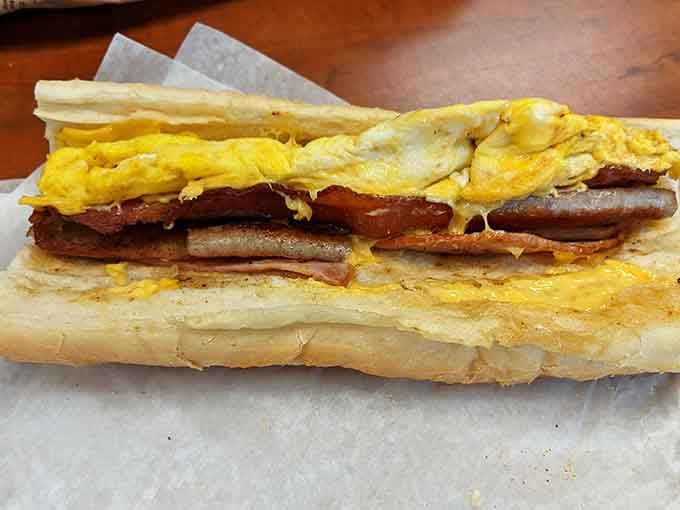 Breakfast sandwich artistry that proves eggs and sausage on bread is less a meal and more a morning philosophy.