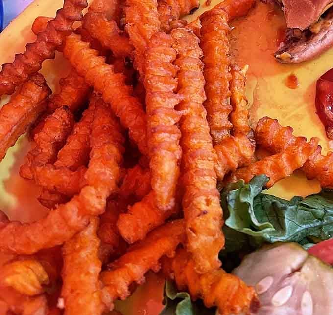 Sweet potato fries so perfectly crisp and golden, they deserve their own trophy. The ideal sidekick for any diner adventure.