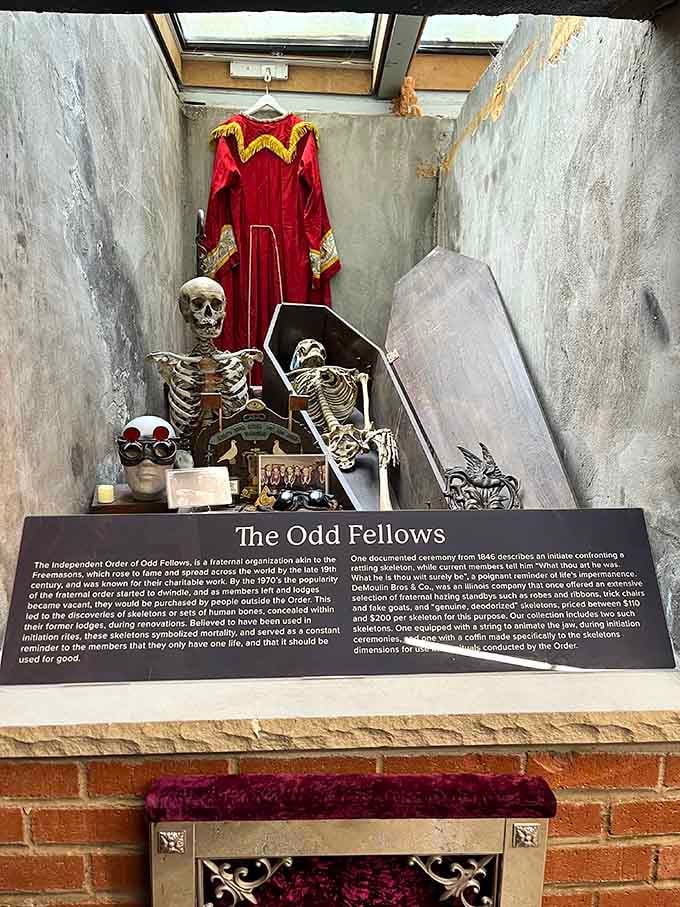 The Odd Fellows display features ceremonial skeletons and regalia, because fraternal organizations took their symbolism very, very seriously.