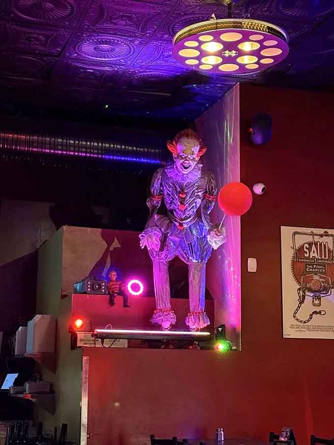 Pennywise looms overhead because apparently someone thought clowns would improve your appetite. Bold choice.