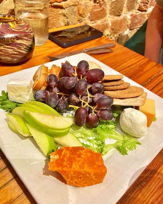 A proper cheese board with fresh fruit and crackers is proof that simple done right beats complicated done wrong.