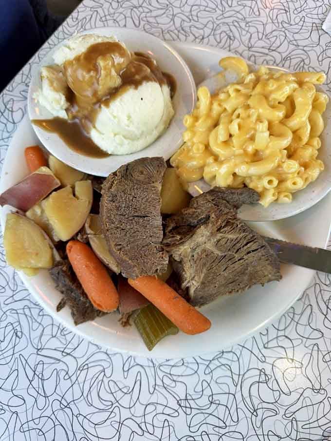 Pot roast with all the fixings: comfort food that makes you forget every diet you ever attempted.