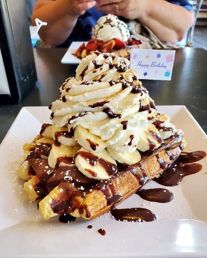 That tower of whipped cream and chocolate deserves its own zip code and possibly a birthday card.