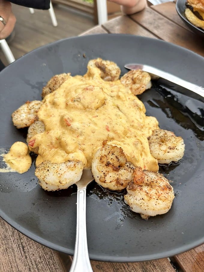 Plump shrimp nestle into creamy gouda grits that'll make you reconsider every cheese decision you've ever made.