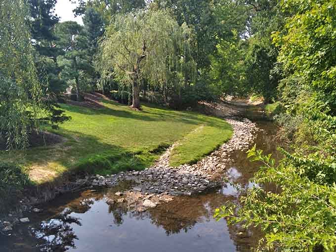Kent Creek flows peacefully below, providing the perfect soundtrack for your storybook cottage experience.