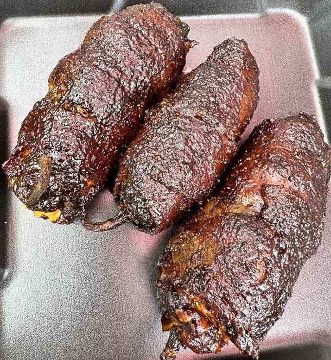 Barbecue perfection doesn't need fancy packaging. These smoke-kissed beauties with their glistening bark represent Texas in its most delicious form&mdash;no passport required.