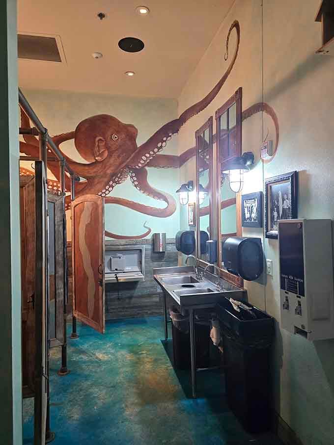 Even the restrooms commit to the theme with an octopus mural, because why should handwashing be boring?