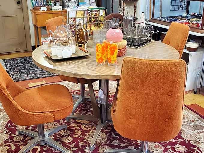 That burnt orange velvet screams 1970s louder than a disco ball, and honestly, we're here for every groovy inch of it.