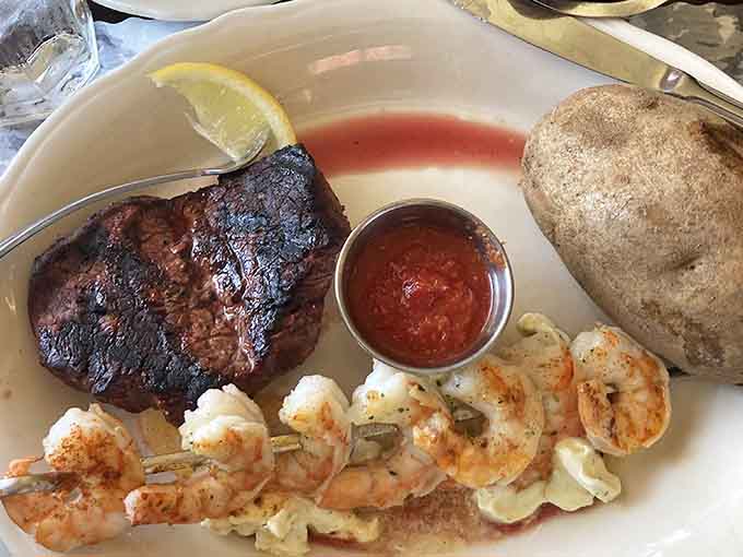 That char on the steak and those perfectly grilled shrimp prove that charcoal grilling is an art form worth preserving.