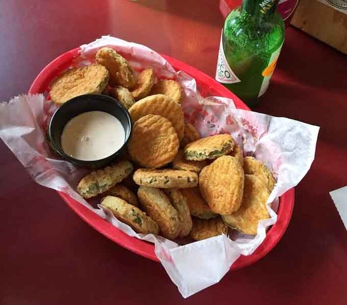 Fried pickles with a side of creamy dipping sauce: because sometimes vegetables need a little encouragement to be exciting.