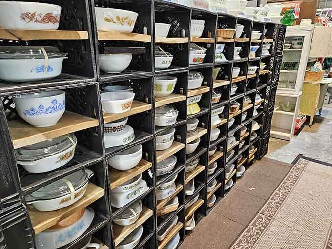 Pyrex paradise! Every pattern your grandmother ever served potato salad in, meticulously organized for maximum nostalgia impact.