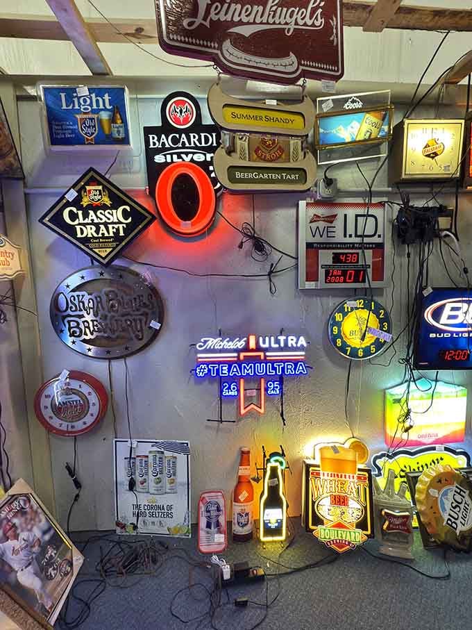 Beer signs glowing like a time capsule from every bar your parents told you not to visit.