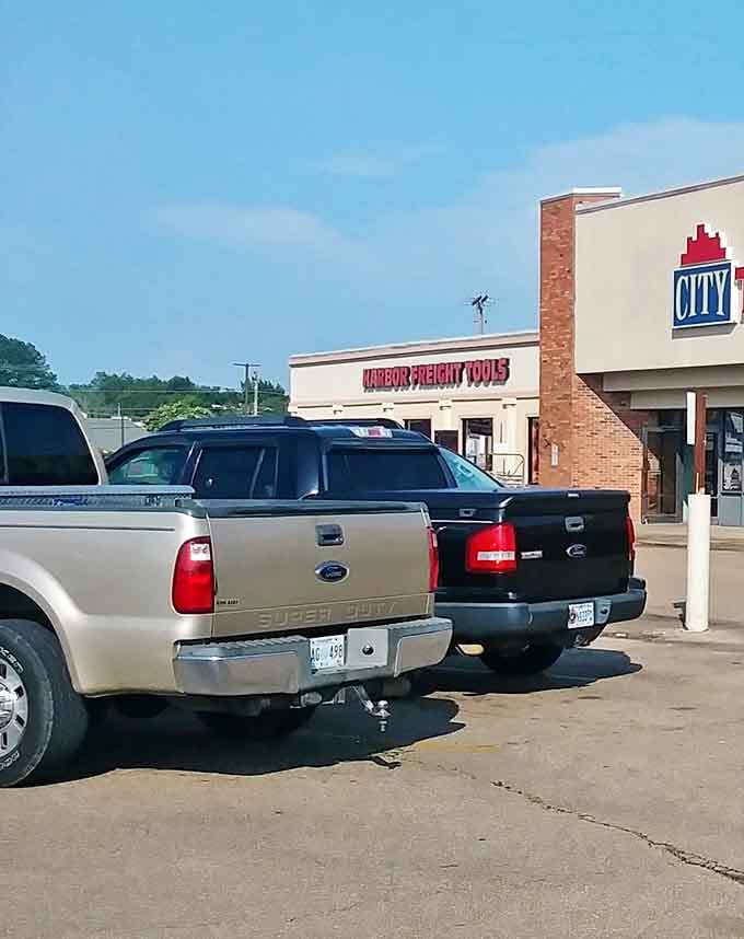 Even the parking lot hints at the popularity of this thrifting mecca. Pickup trucks stand ready to haul away the day's larger discoveries.