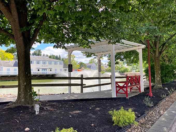 A shaded pergola provides the perfect excuse to rest your feet and pretend you're done shopping for today.