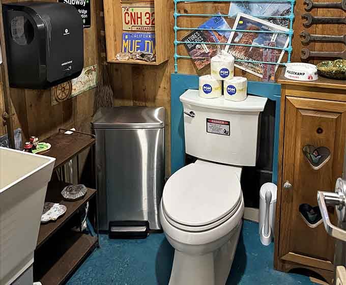 Even the restroom embraces the vintage vibe – where else would license plates and memorabilia turn a necessary stop into a mini-museum visit?